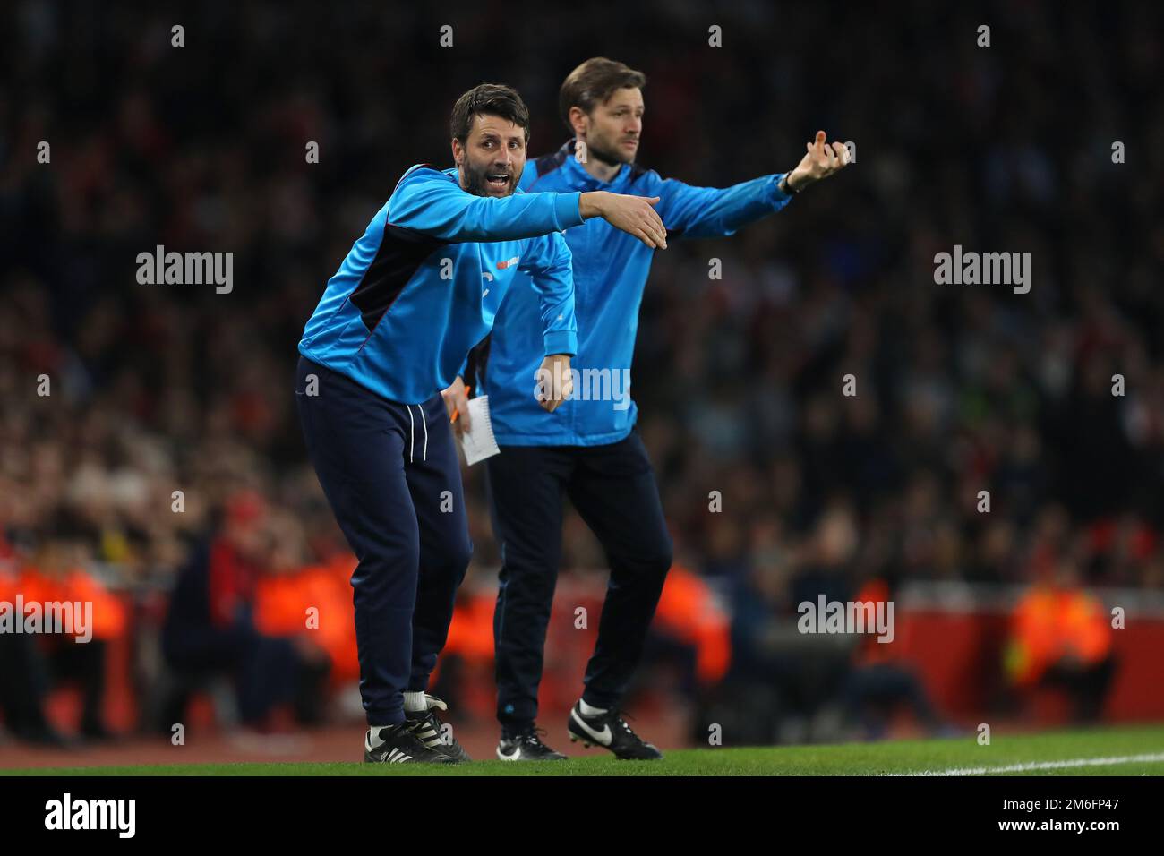 Manager of Lincoln City, Danny Cowley and brother, Nicky animated on ...