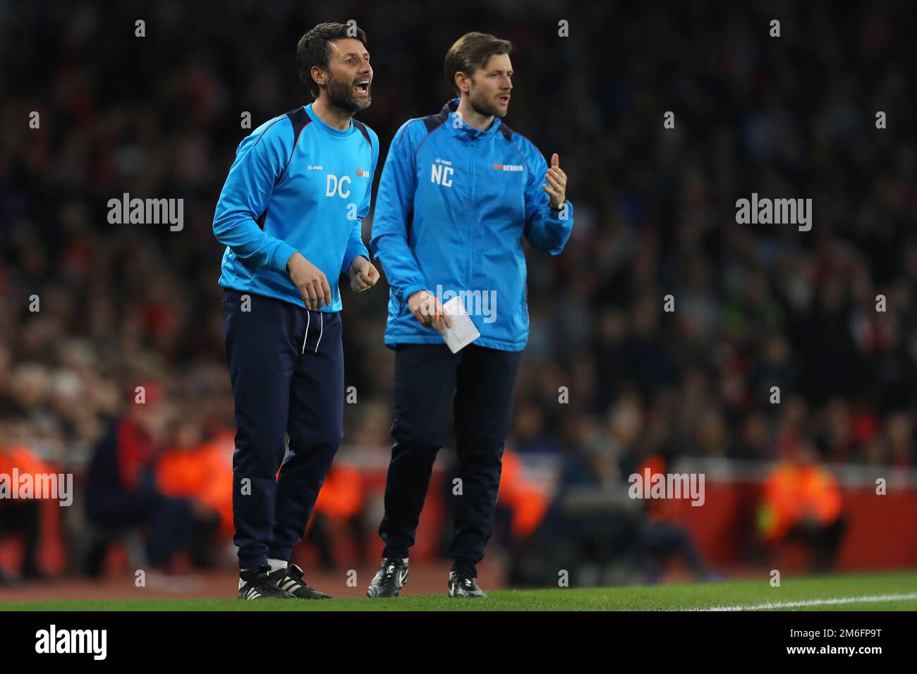 Manager of Lincoln City, Danny Cowley and brother, Nicky on the touch ...