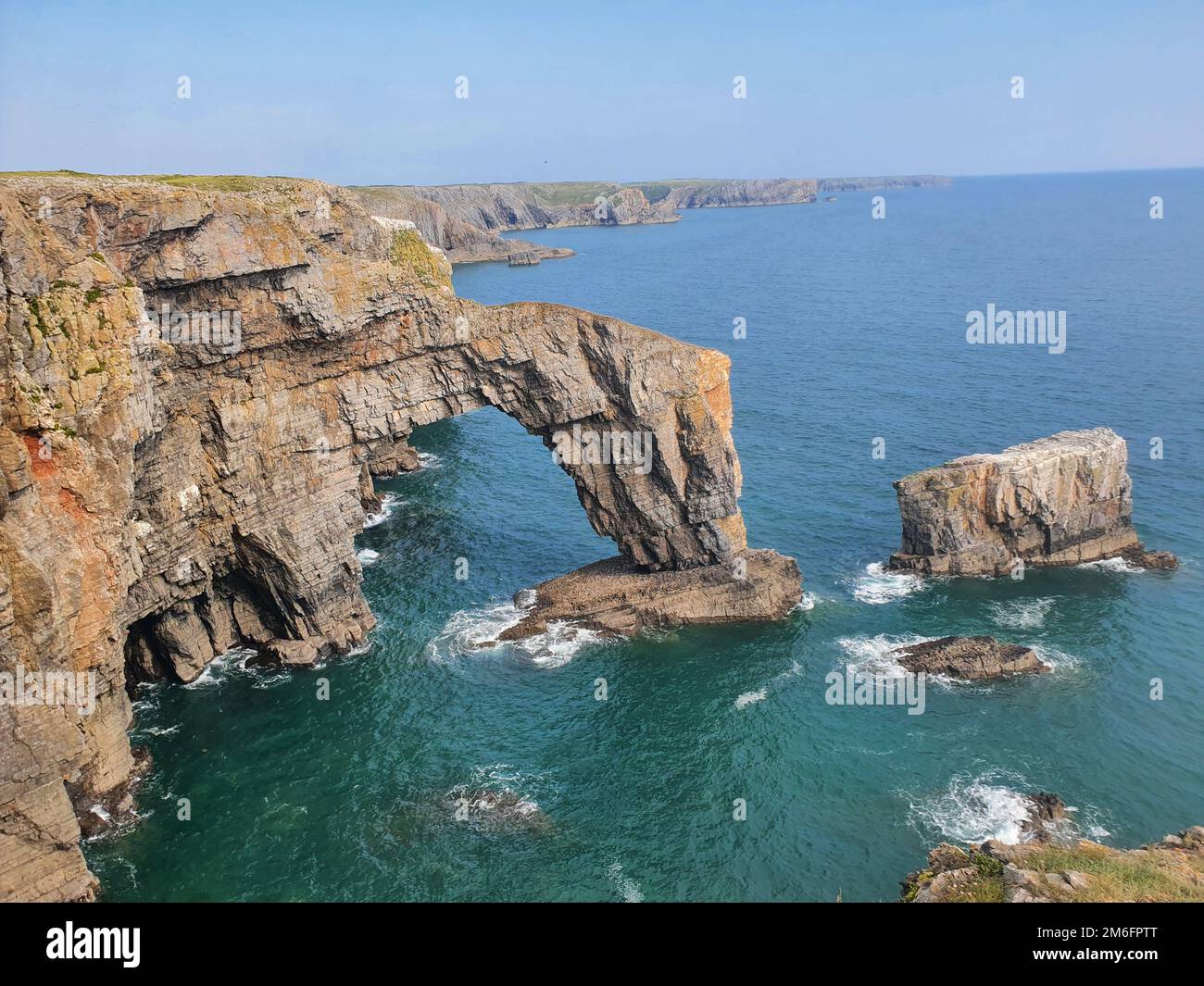 A top view of the natural arch, rugged limestone of Green Bridge of ...