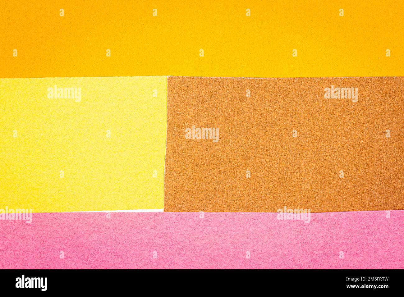Multicolor background from a paper of different colors. Abstract ...