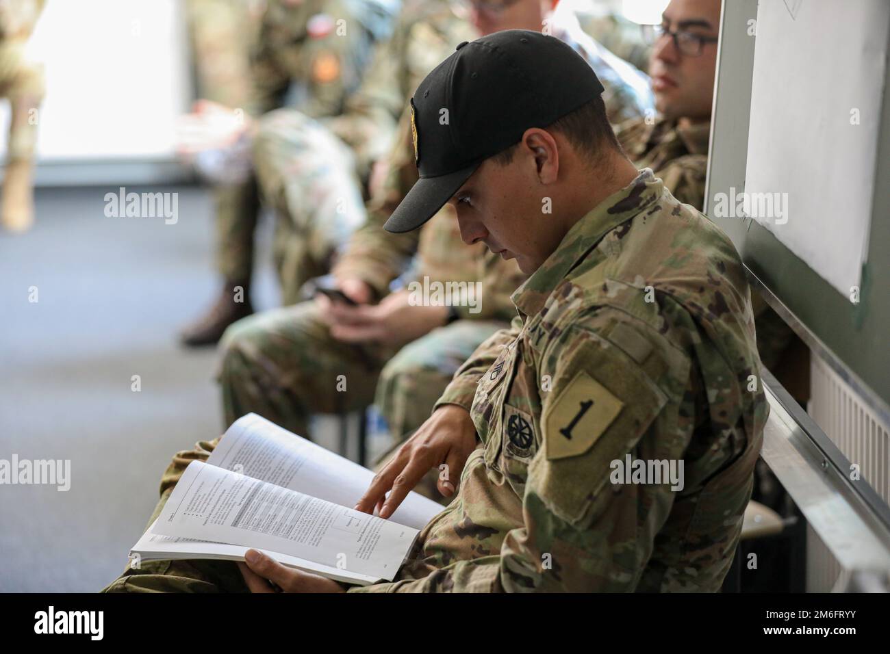 U.S. Army Staff Sgt. Christopher Montoya, master gunner, assigned to ...