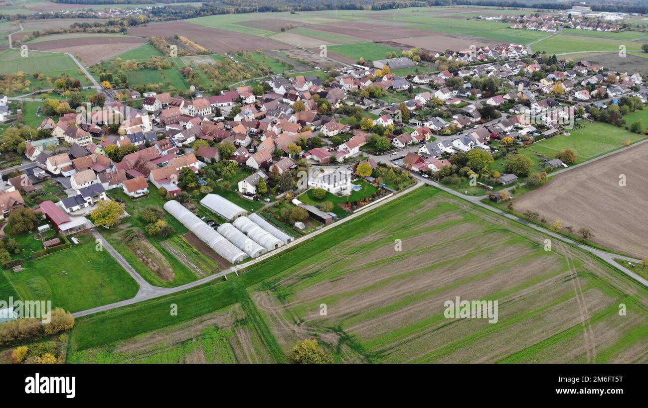 Village on the Field Stock Photo - Alamy