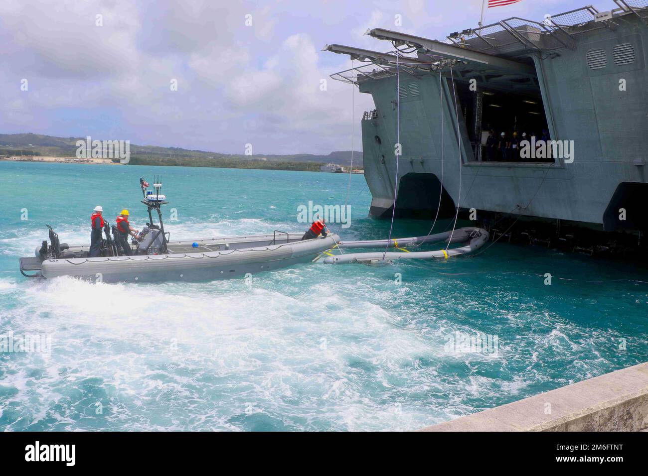 220427-O-NR876-490 APRA HARBOR, Guam (April 27, 2022) Sailors drive the ...