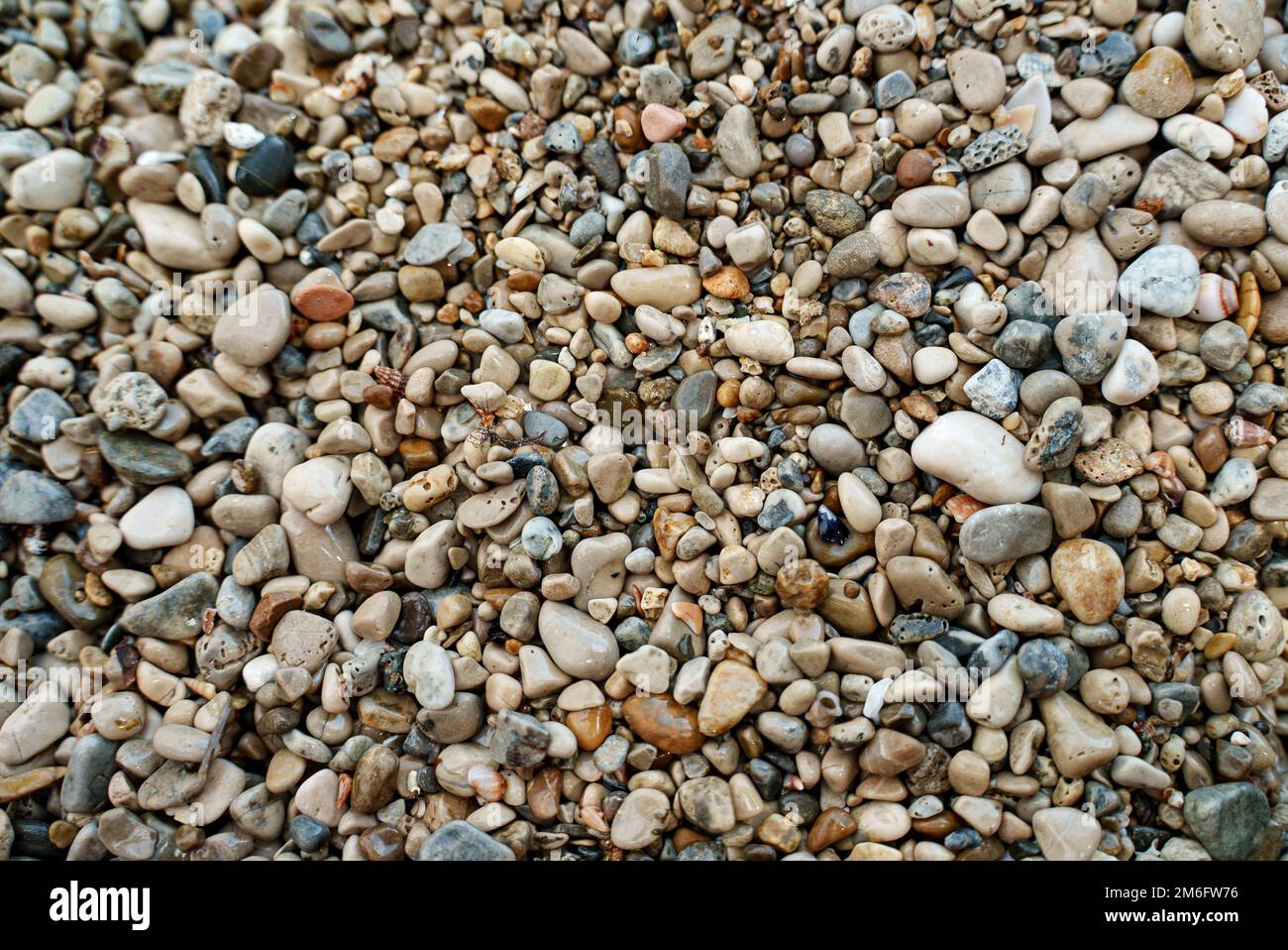 Sea stones background. Flat lay texture of sea stones Stock Photo - Alamy