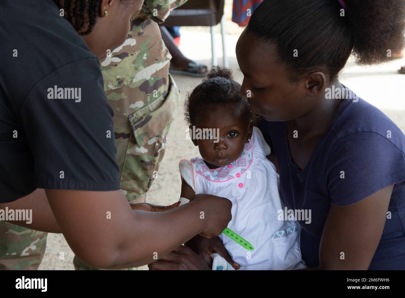 A 13-month-old Liberian girl receives treatment as part of 14 Military ...
