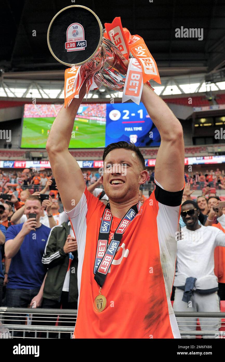 Will Aimson of Blackpool celebrates with the trophy - Blackpool v ...