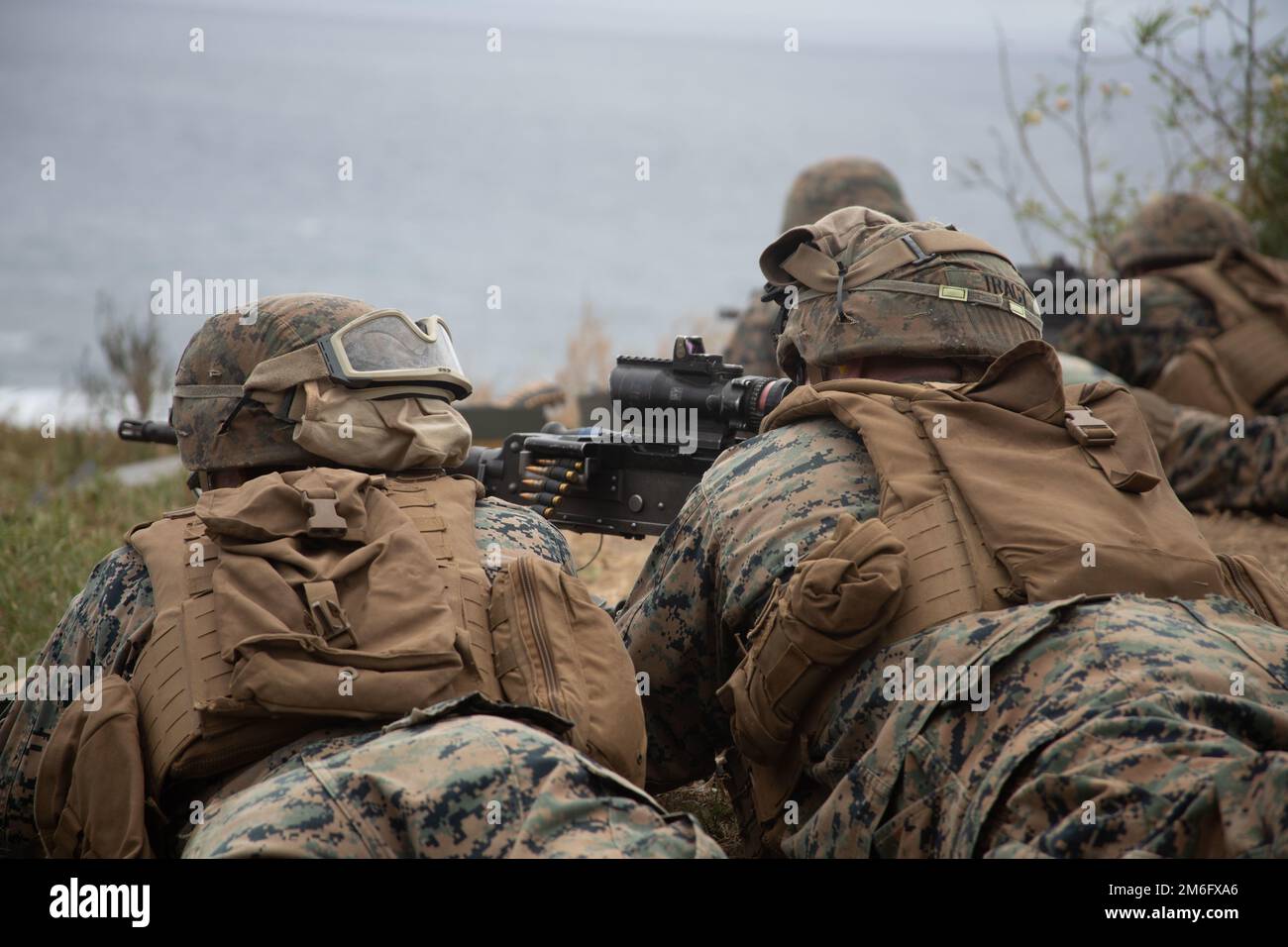 U.S. Marine Corps Lance Cpl. Reh Kay, left, and Lance Cpl. Andrew Tracy ...