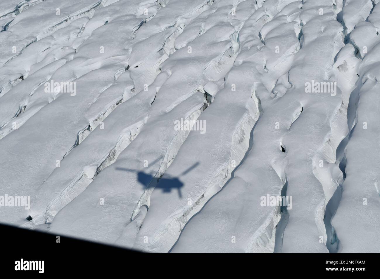 The shadow of a CH-47F Chinook helicopter is superimposed on Ruth ...