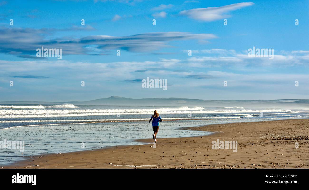 Lossiemouth East Beach Moray coast Scotland a blue sky white clouds and ...