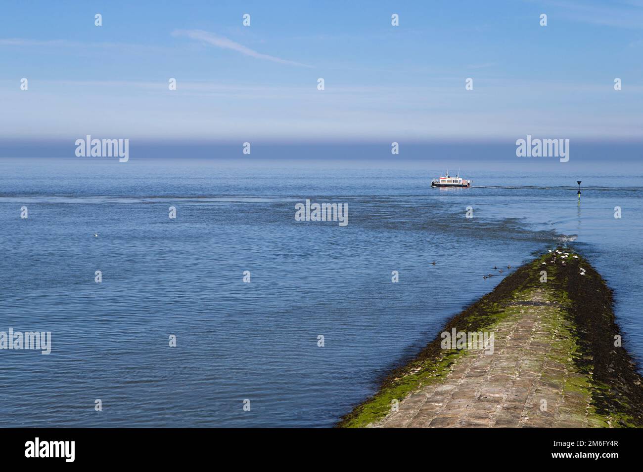 Land pier with survey vessel Stock Photo - Alamy