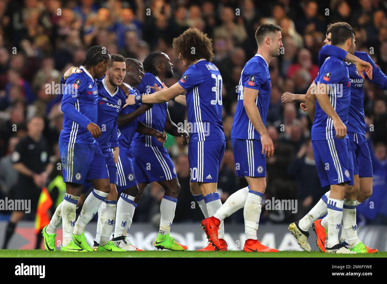 Ngolo Kante of Chelsea is congratulated after scoring the opening goal ...