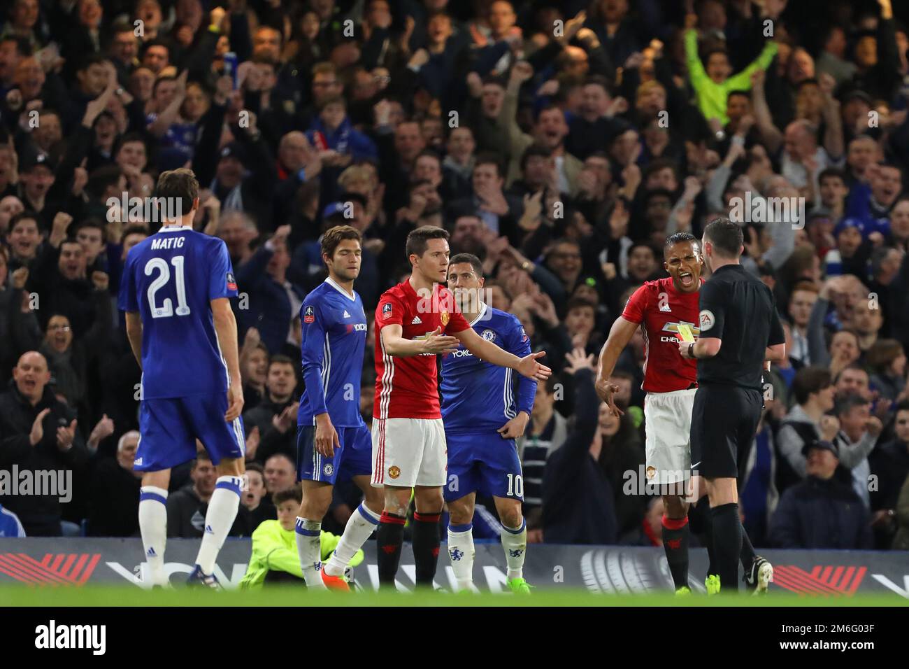 Ander Herrera of Manchester United argues with Referee, Michael Oliver ...