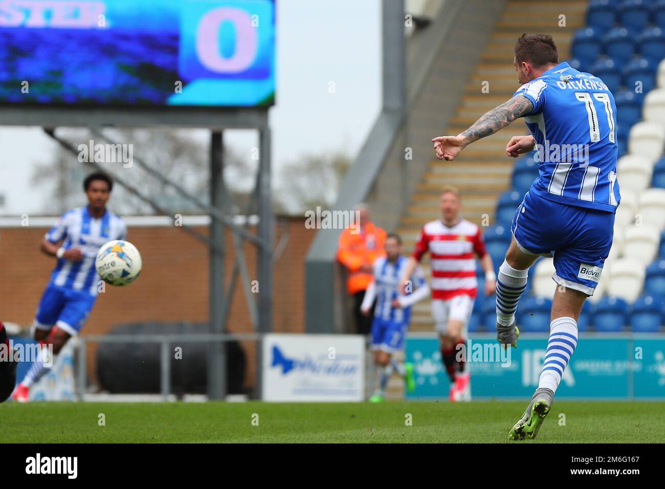 Ben Dickenson of Colchester United scores the opening goal, making it 1 ...