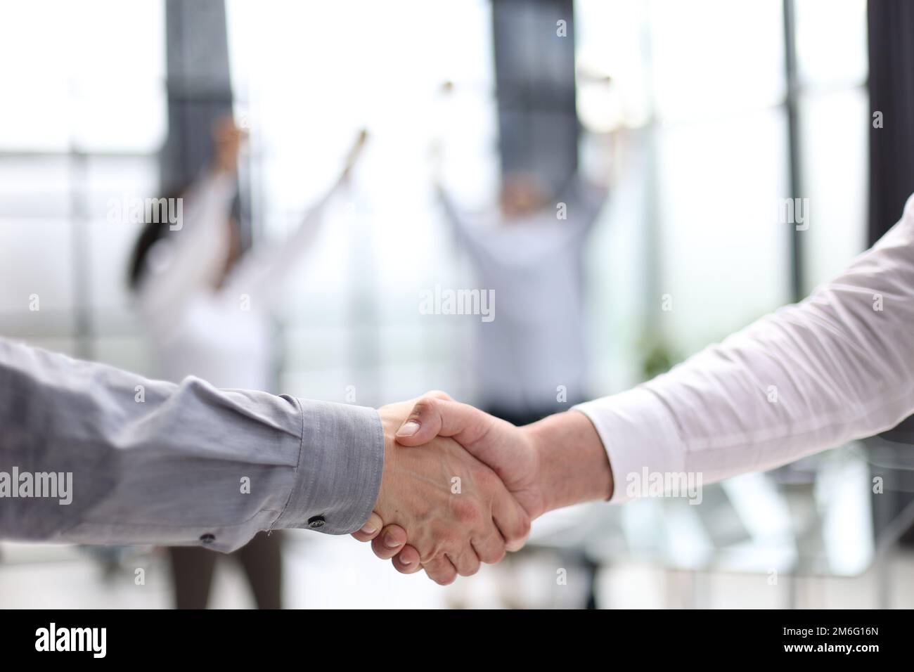Businessman handshake for teamwork of business merger and acquisition ...