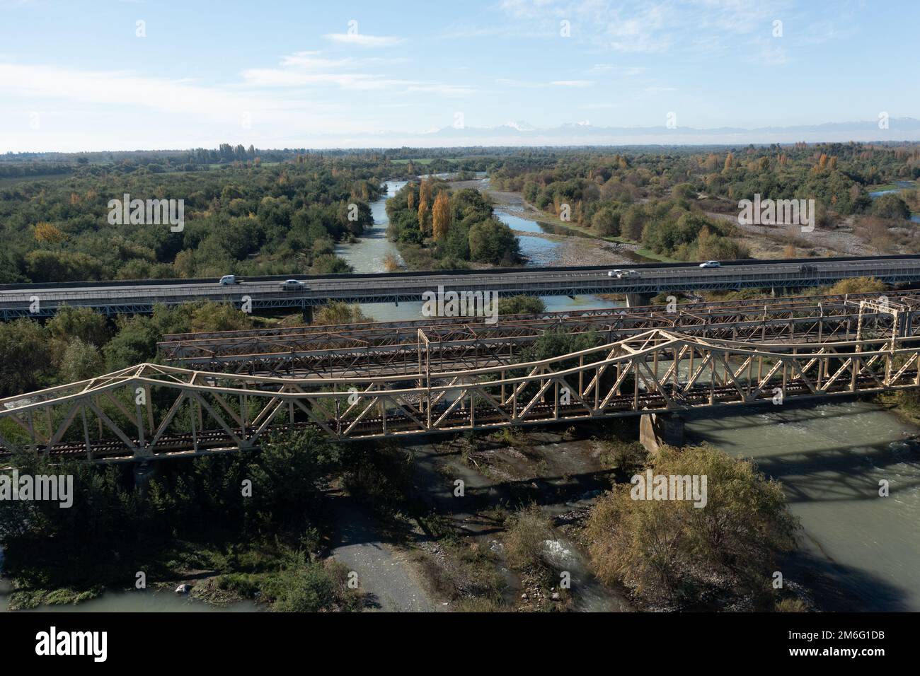 Aerial view of the railroad bridge above a river in Maule region, Chile ...