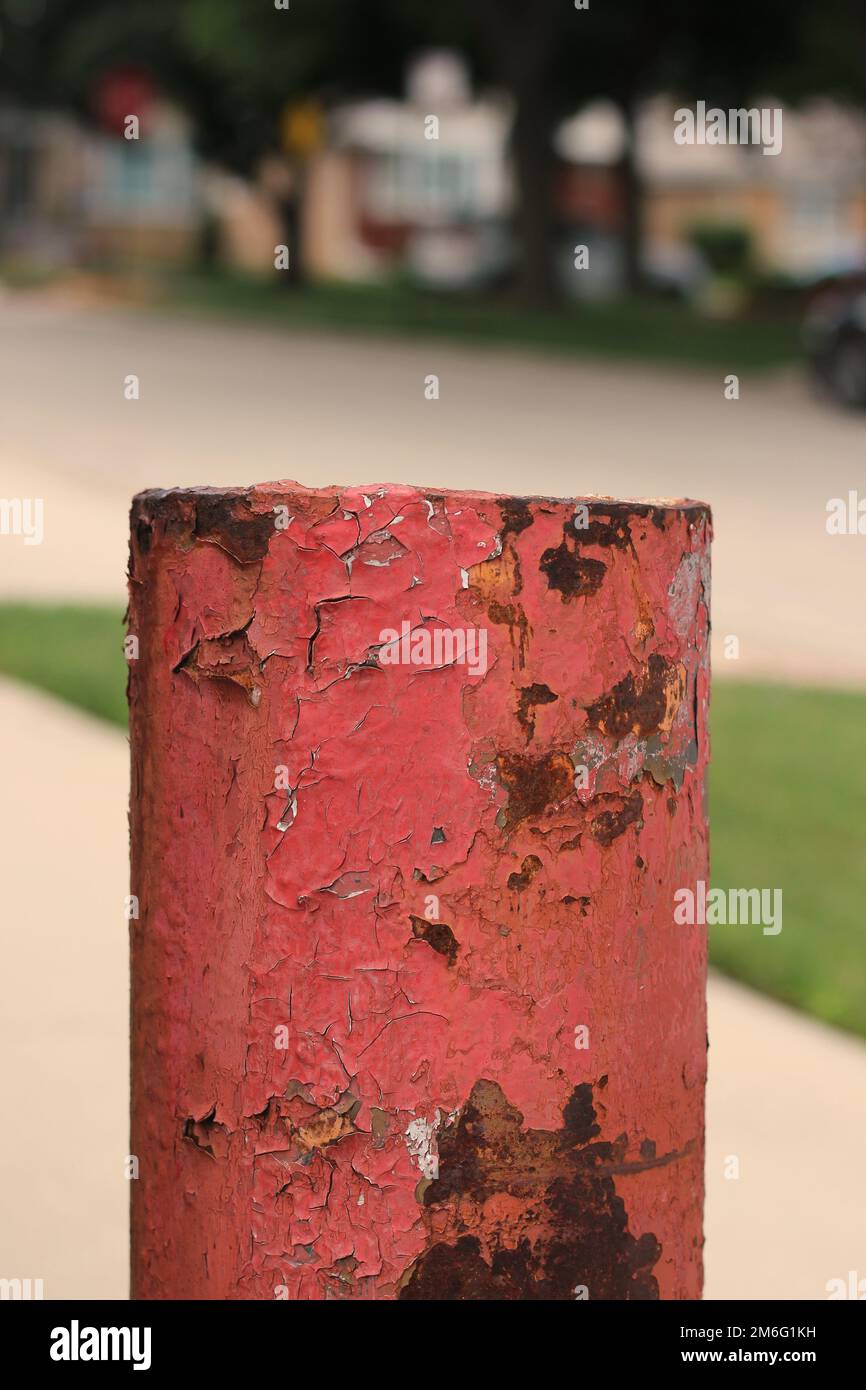 A strong industrial strength heavy duty metal post standing as a ...