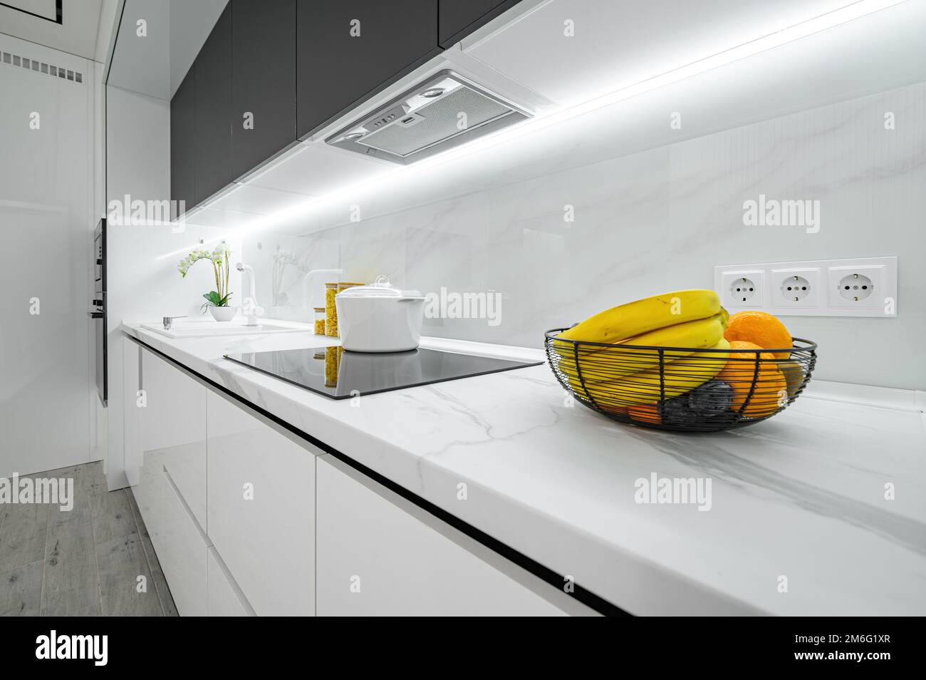 Luxury white and black modern marble kitchen Stock Photo - Alamy