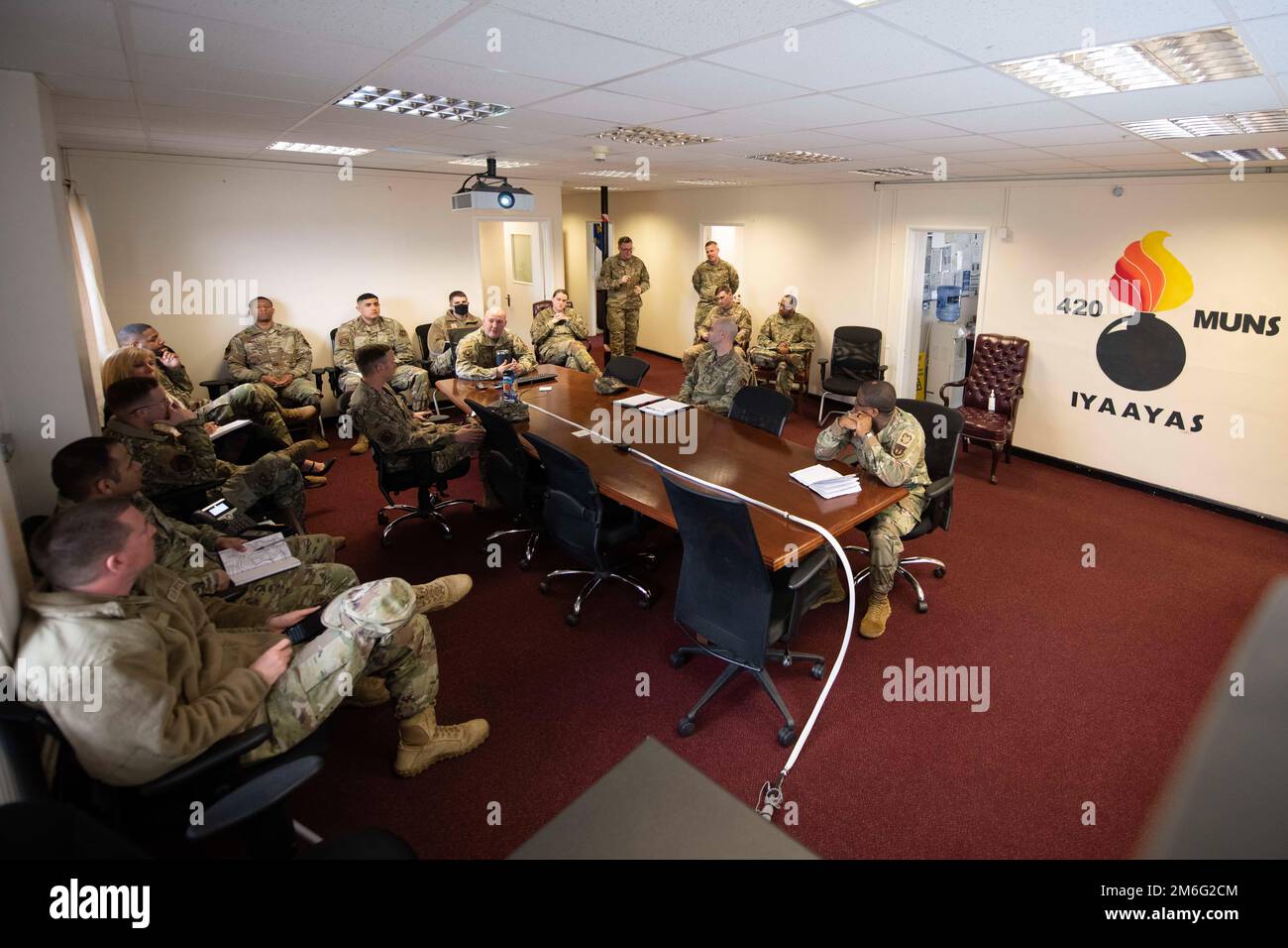 U.S. Air Force Senior Master Sgt. Michael Carvalho, center, 420th ...