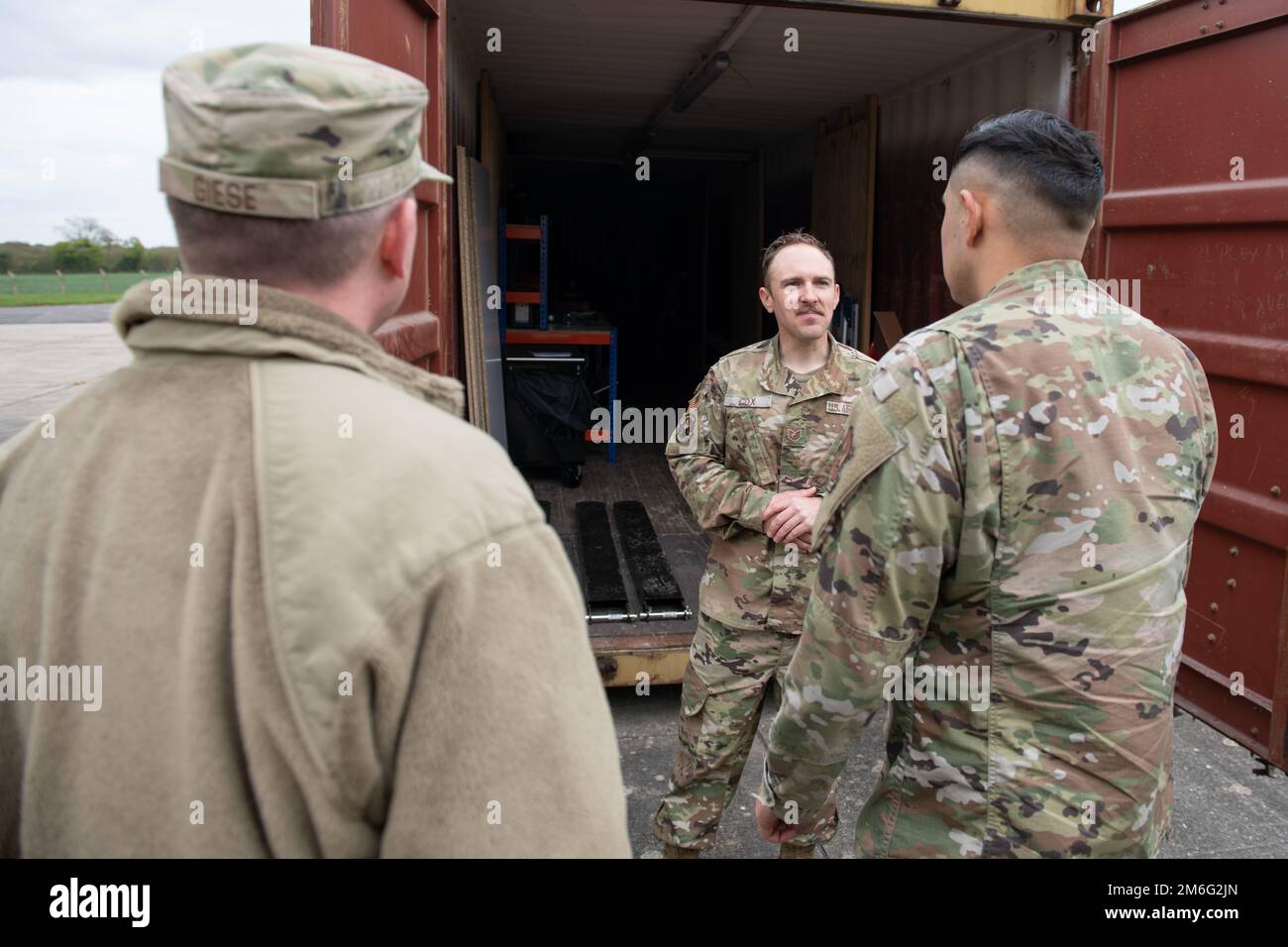 U.S. Air Force Tech. Sgt. Spenser Cox, center, 420th Munitions Squadron ...