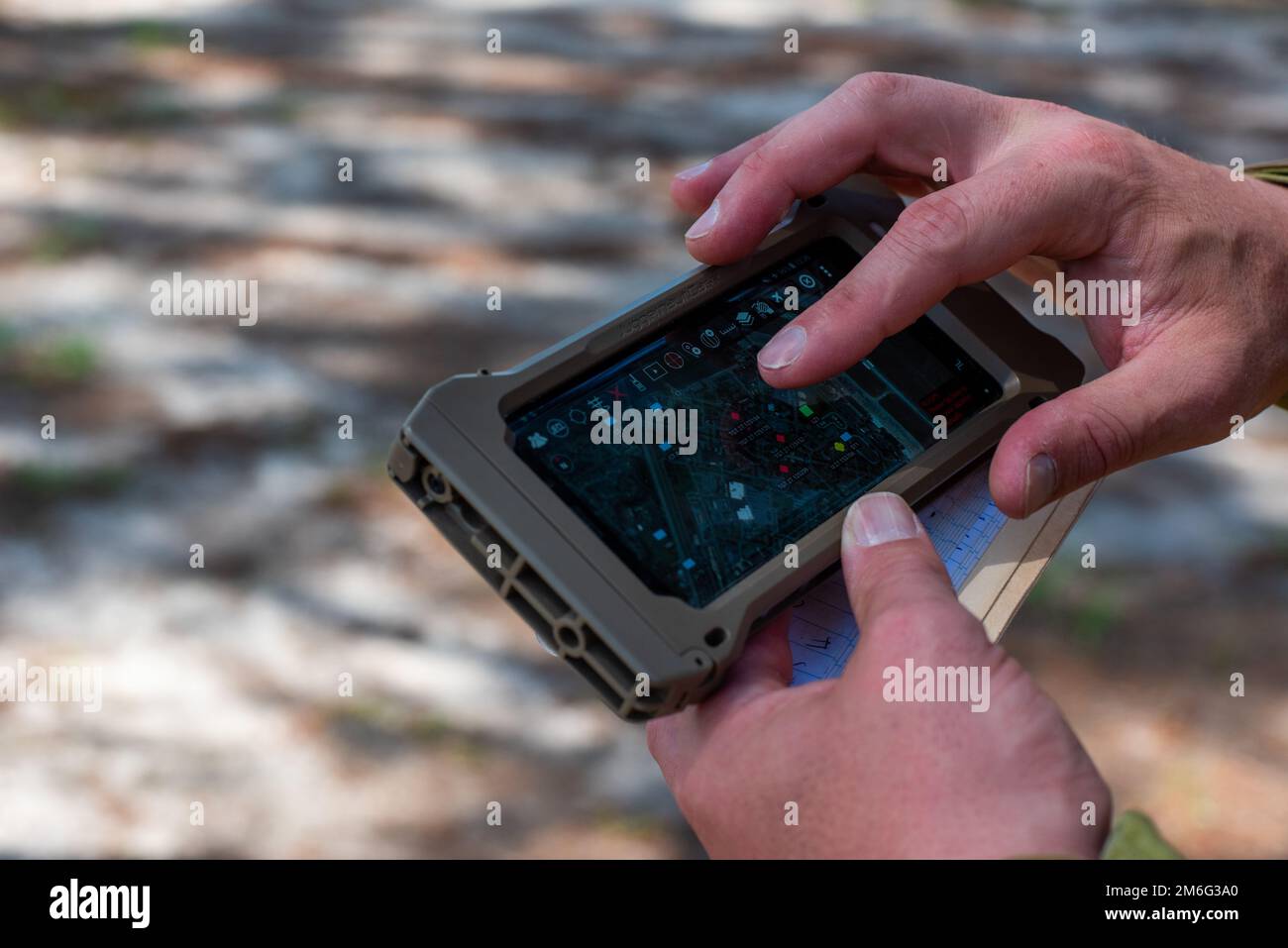 An Australian Army Joint Terminal Attack Controller uses mapping ... An Australian Army Joint Terminal Attack Controller uses mapping ...