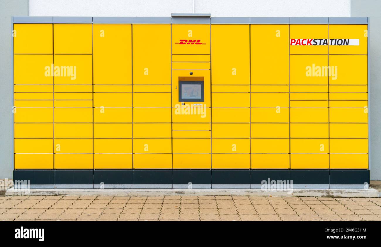 DHL Packstation for mail and parcels Stock Photo - Alamy