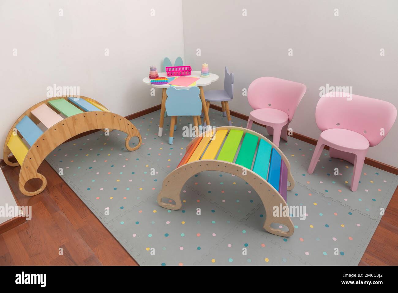 recreational area for children in a pediatric office, with tables ...