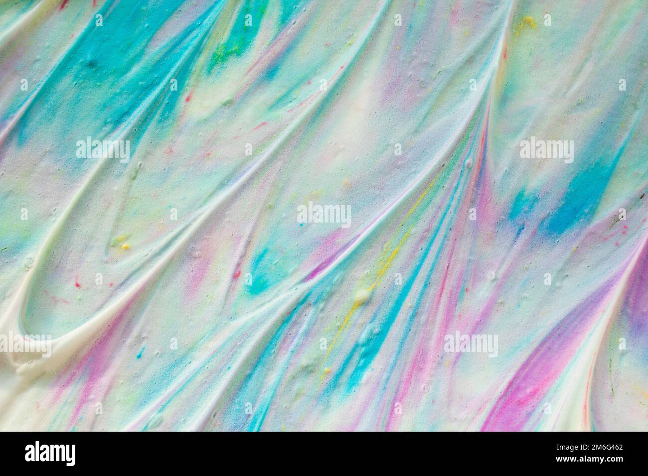 Photograph of a colored foam texture with soft vibrant colors in soft ...