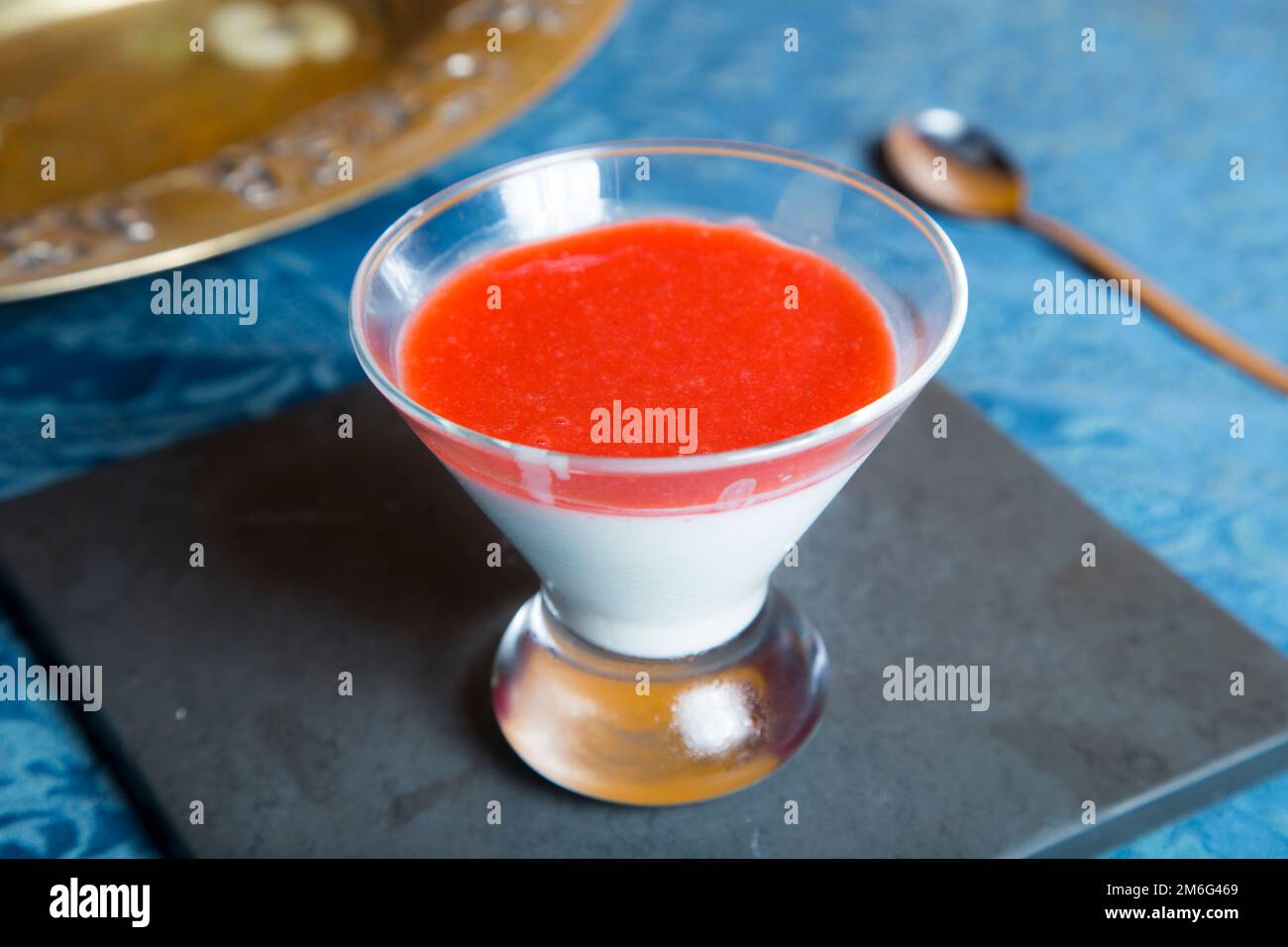 Red fruit panna cotta with strawberries. Italian recipe Stock Photo - Alamy