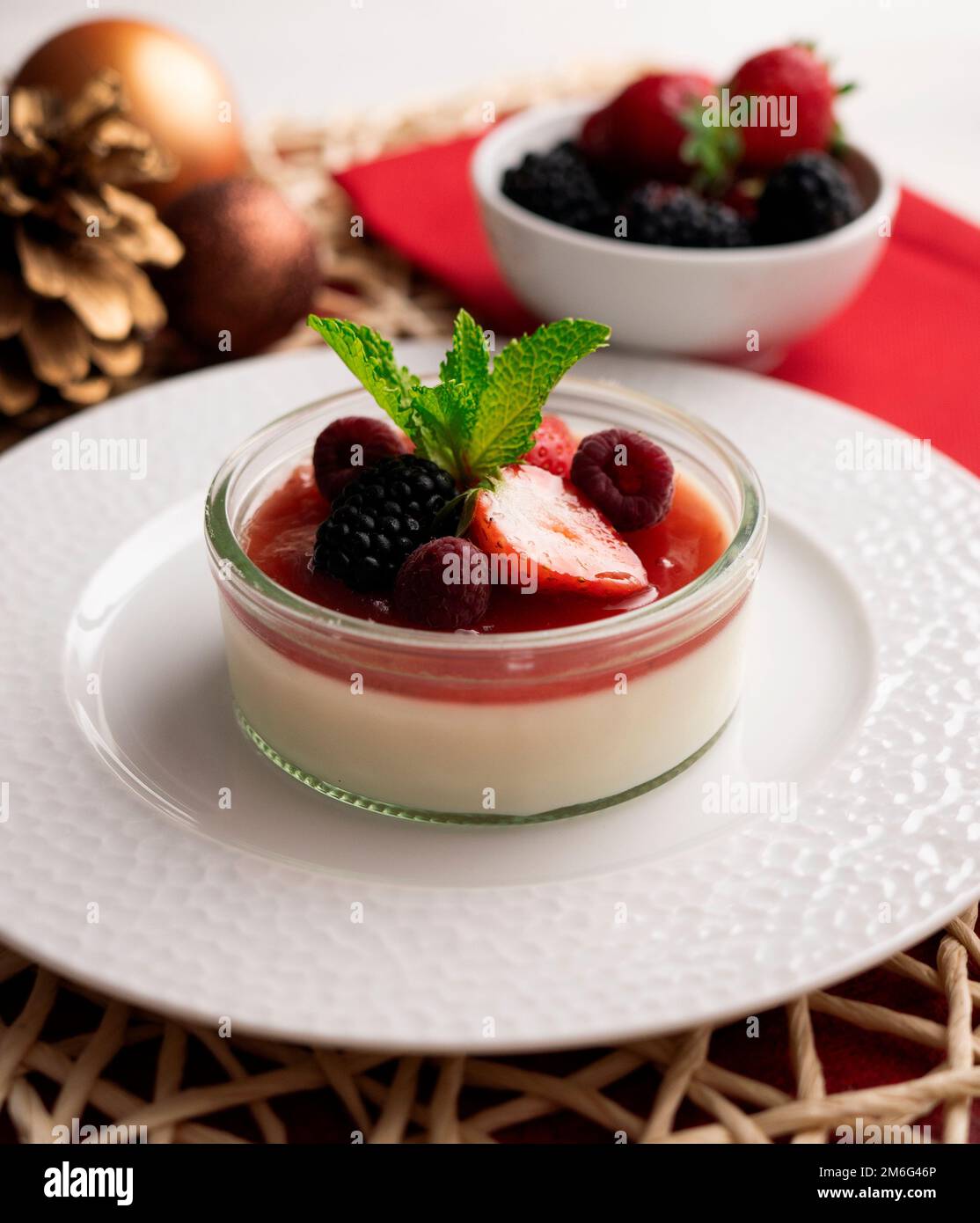 Red fruit panna cotta with strawberries. Italian recipe Stock Photo - Alamy
