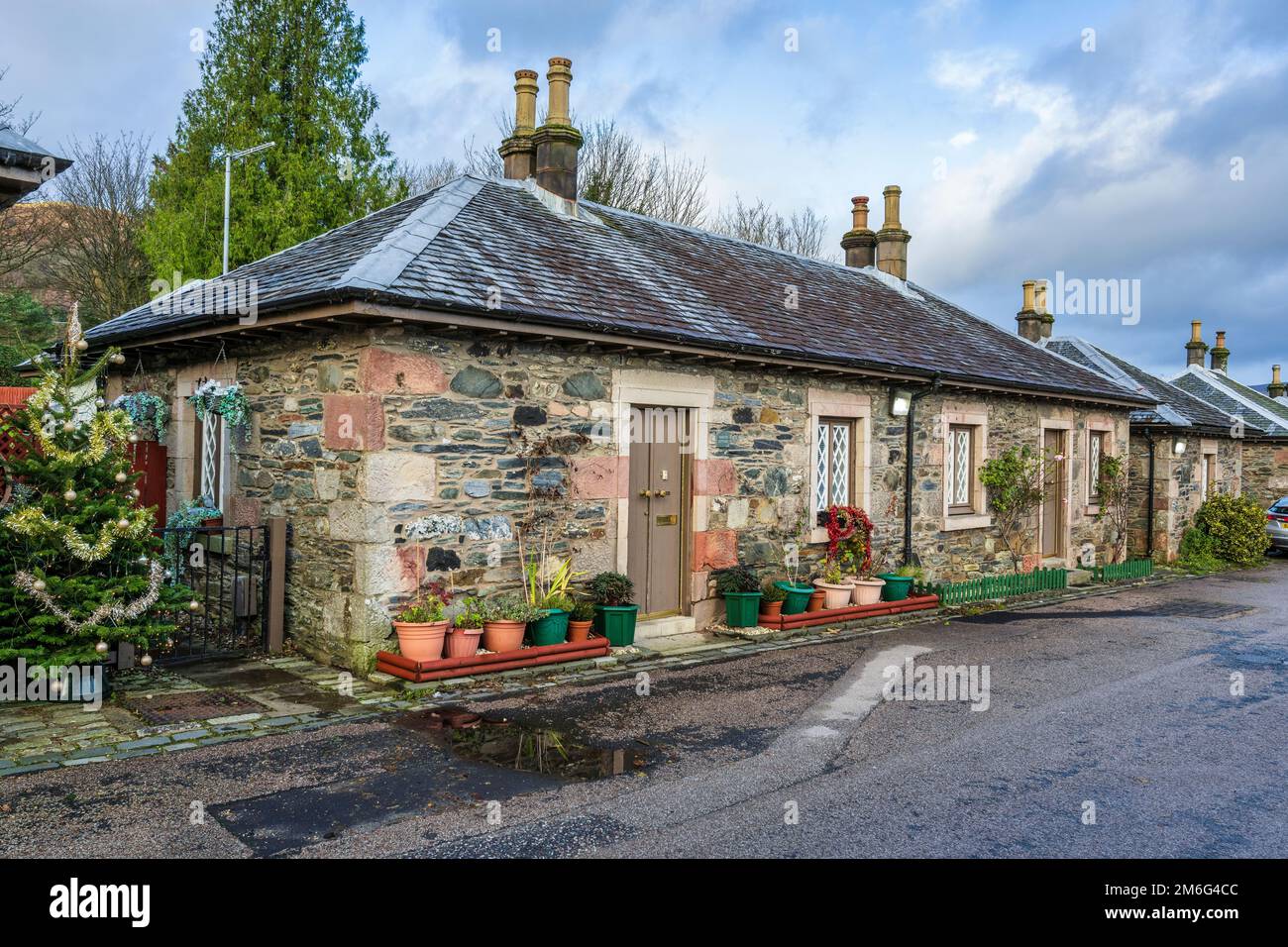 Christmas decorations outside houses along Pier Road in the picturesque ...