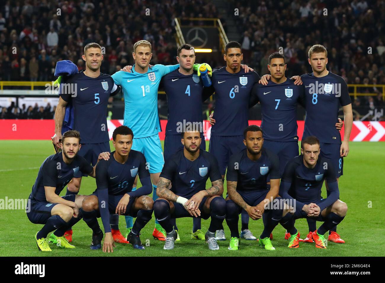 England team line up in their new blue away kit before the match ...