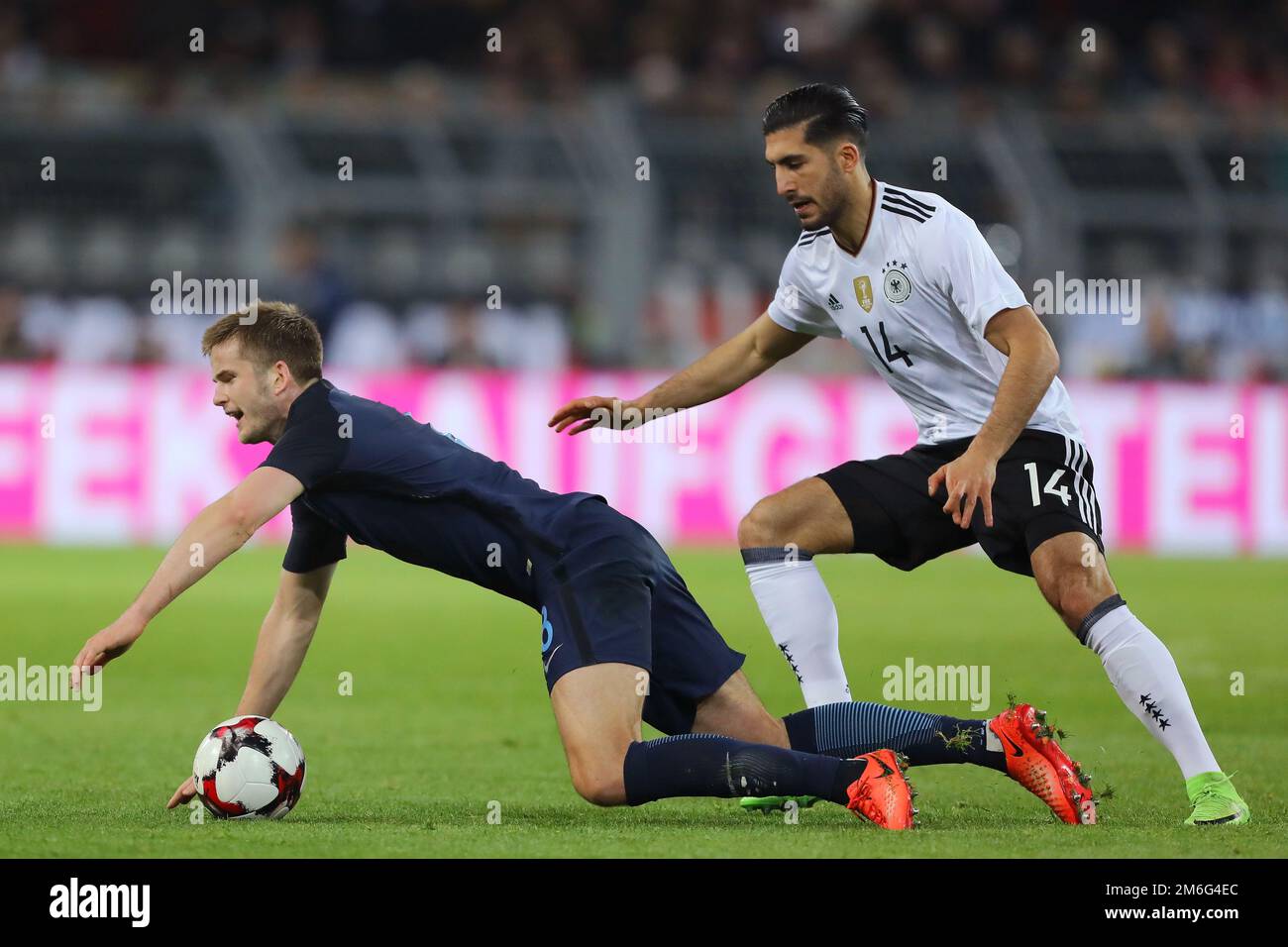 Emre Can of Germany fouls Eric Dier of England - Germany v England ...