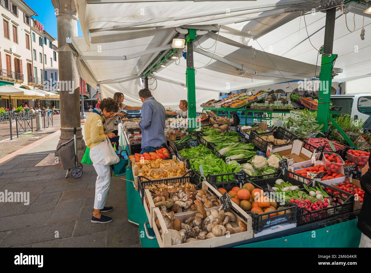 Padua market, view in summer of people buying fruit and vegetables in ...