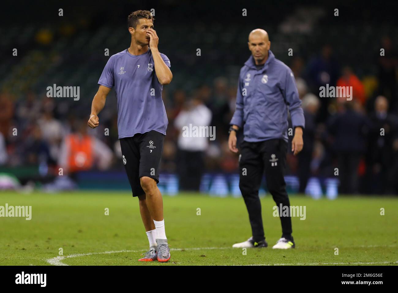 Head Coach of Real Madrid, Zinedine Zidane watches over Cristiano ...