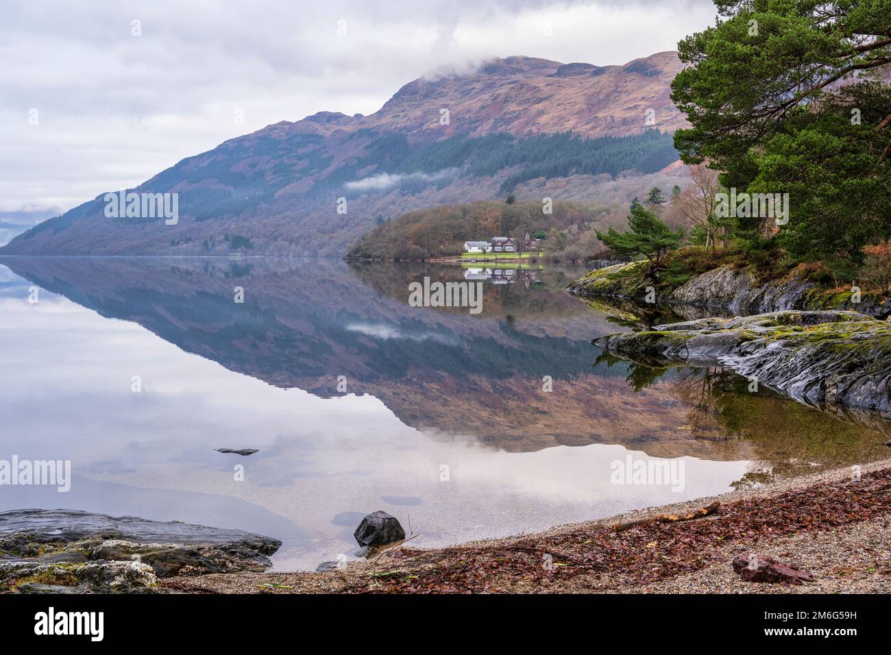 Winter reflections from the beach at Rowardennan on the eastern shore ...