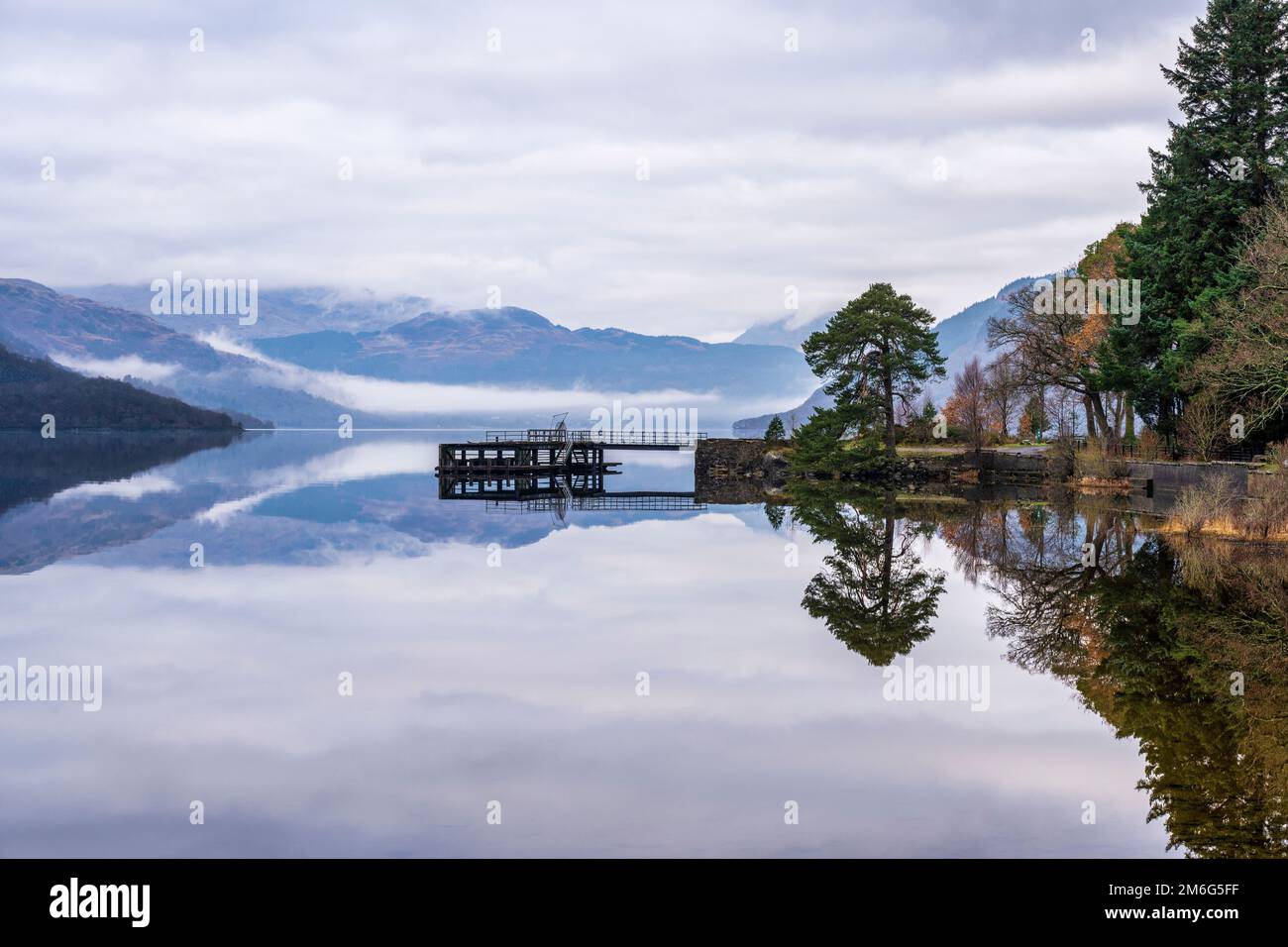 Old pier at Rowardennan on the eastern shore of Loch Lomond in Scotland ...