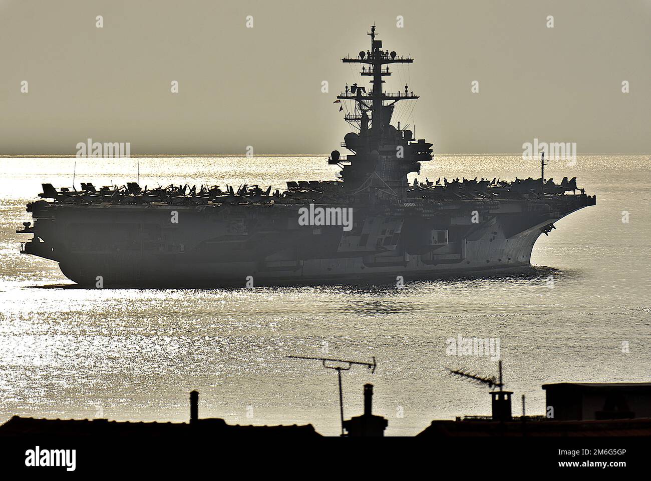 The aircraft carrier USS George H. W. Bush leaves the French ...