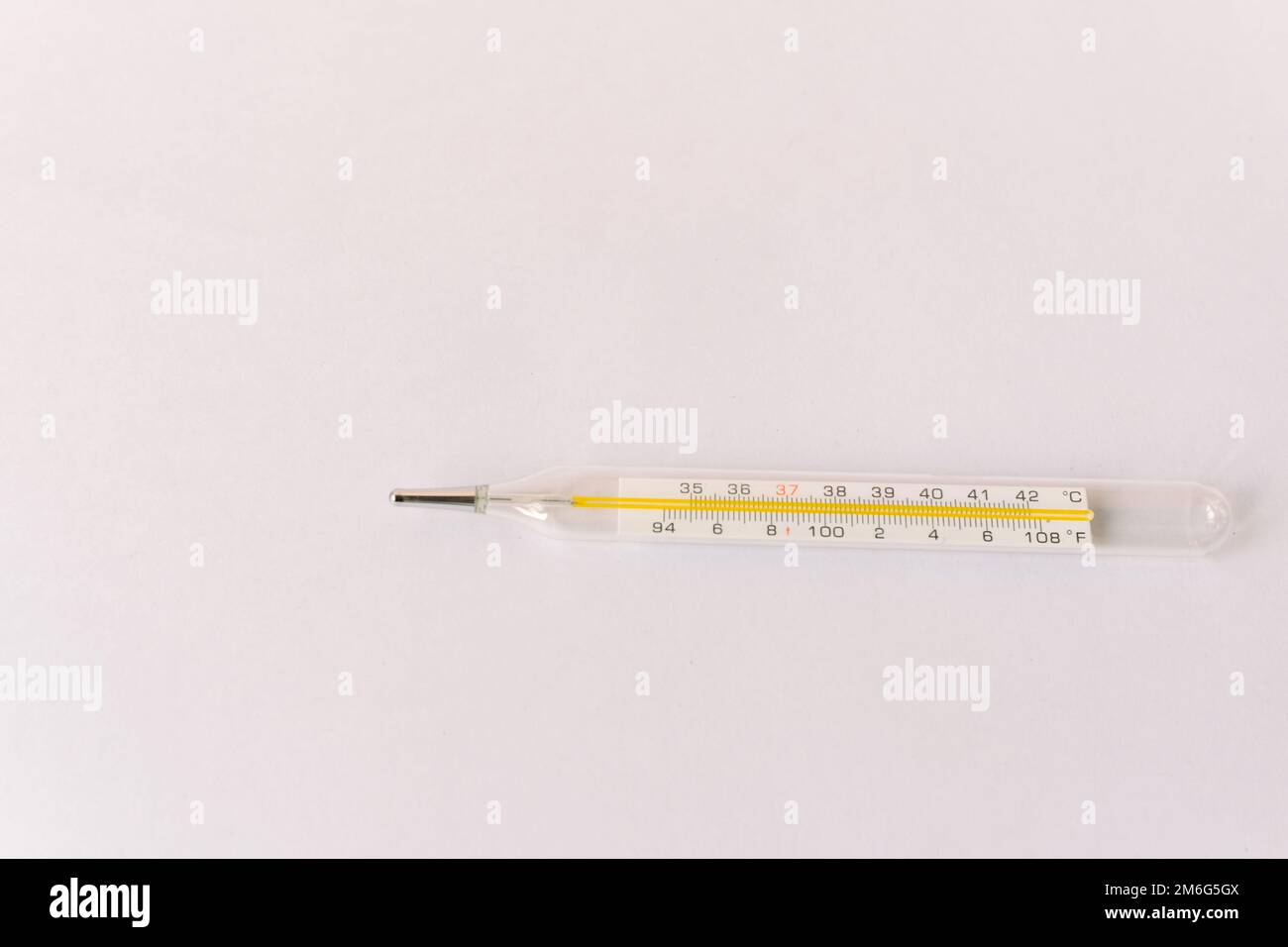 thermometer isolated on white. Fever diagnostic and healthcare concept Stock Photo - Alamy