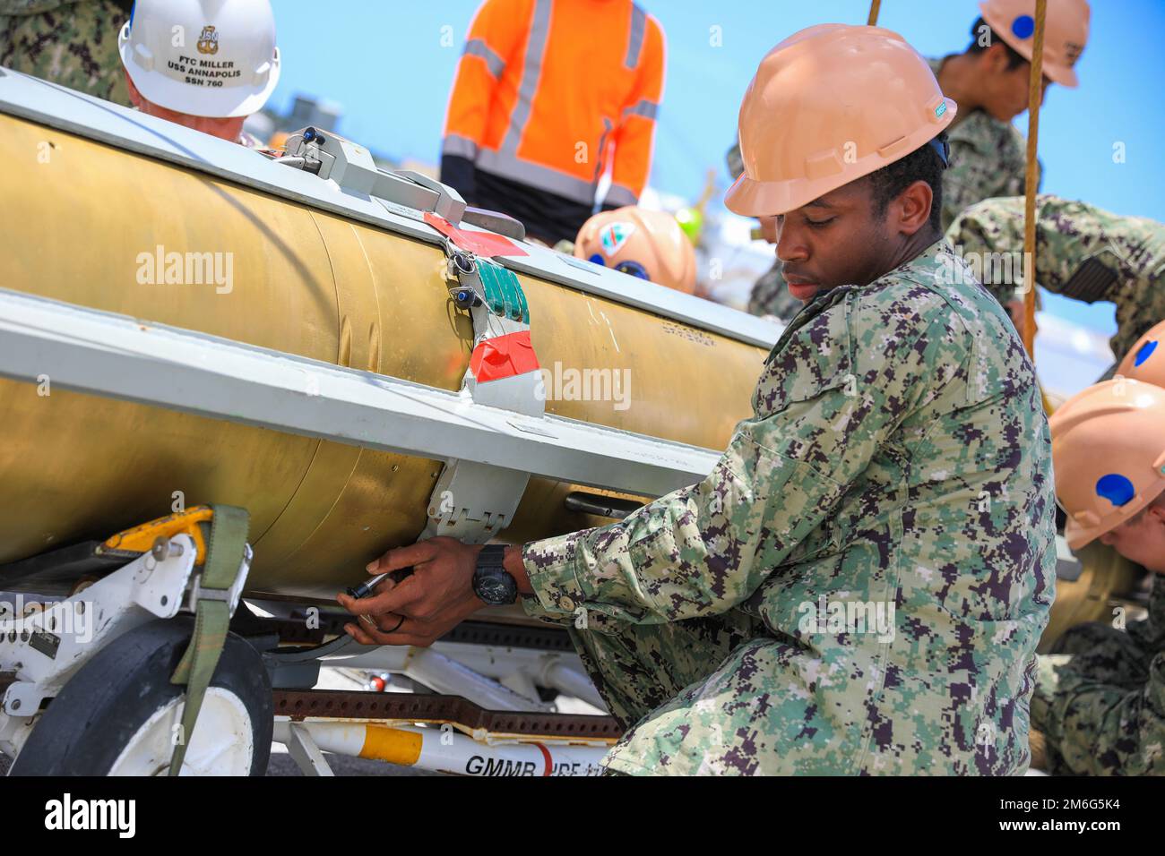 APRA HARBOR, Guam - Sailors assigned to the Los Angeles-class fast ...