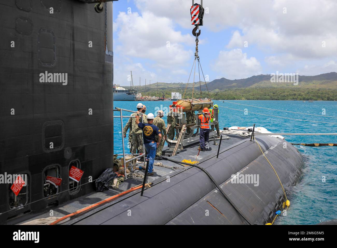 APRA HARBOR, Guam - Sailors assigned to the Los Angeles-class fast ...