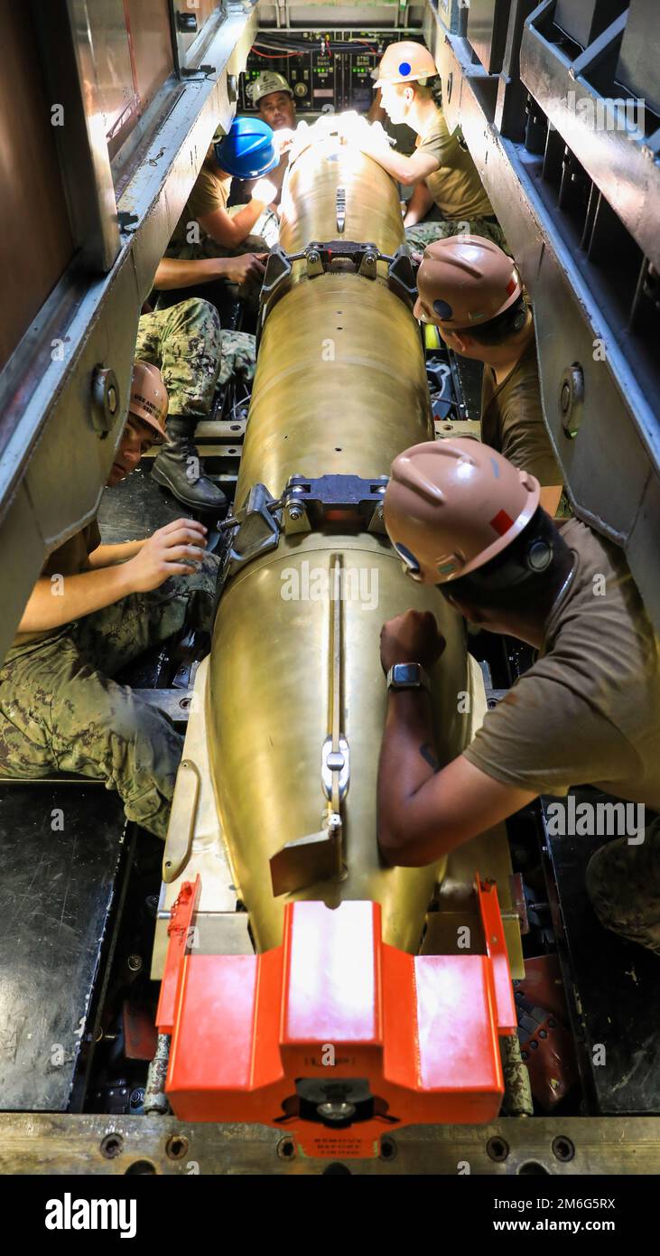 APRA HARBOR, Guam - Sailors assigned to the Los Angeles-class fast ...