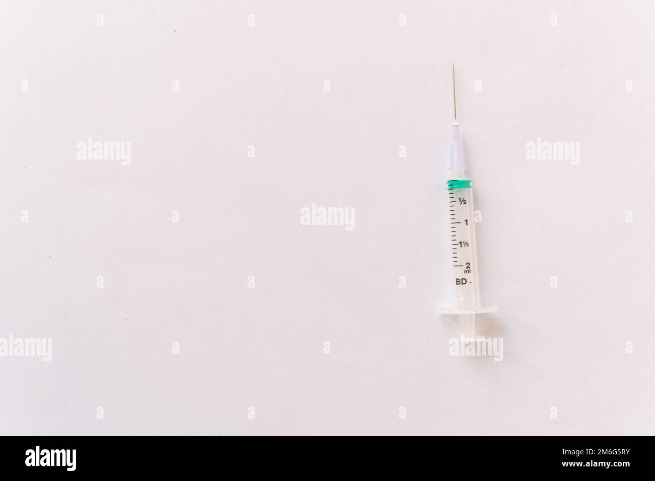 syringe on a white table prepared for injection in hospital Stock Photo ...