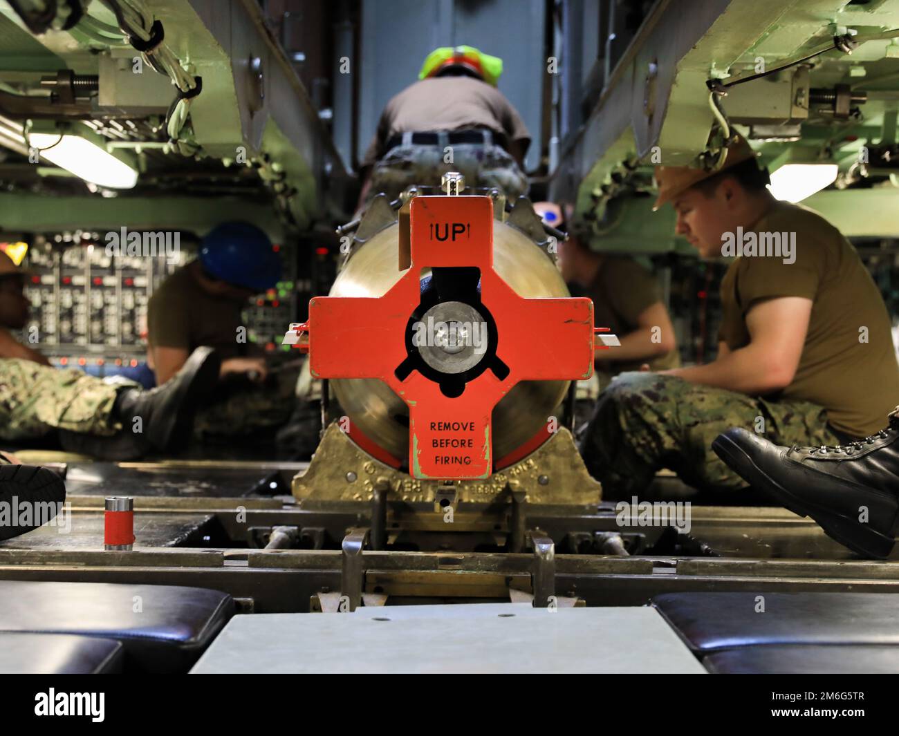 APRA HARBOR, Guam - Sailors assigned to the Los Angeles-class fast ...