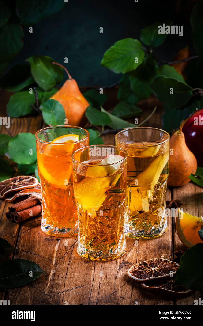 Cider glasses: apple, pear and orange drinks. Fermented low alcohol ...