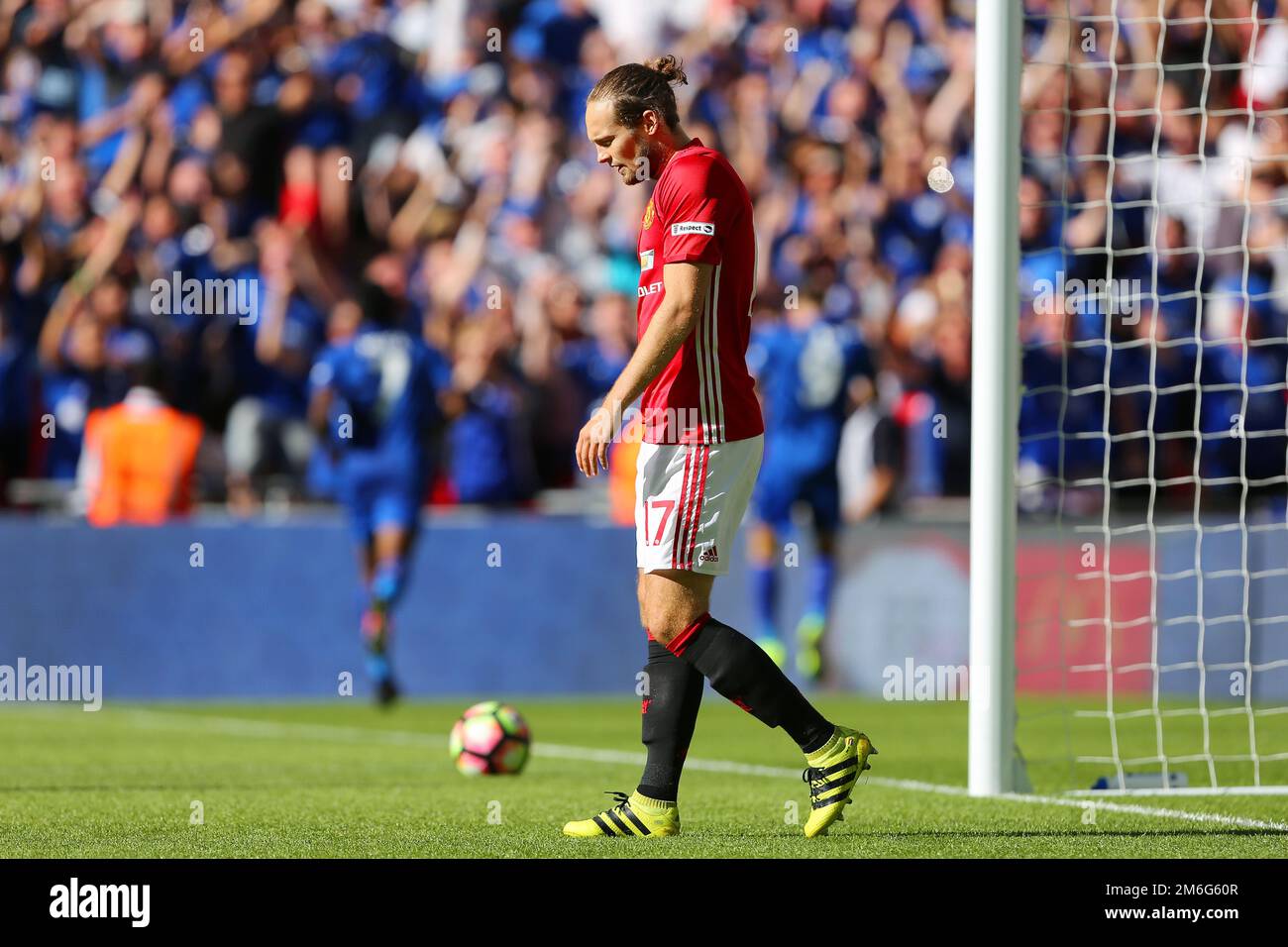 Daley Blind of Manchester United looks dejected as Jamie Vardy of ...