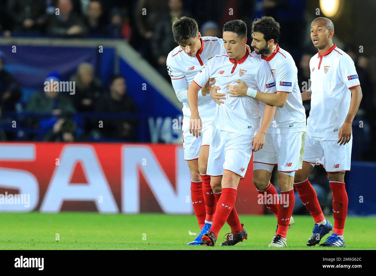 Samir Nasri of Sevilla is man handled off the pitch by his team mates ...