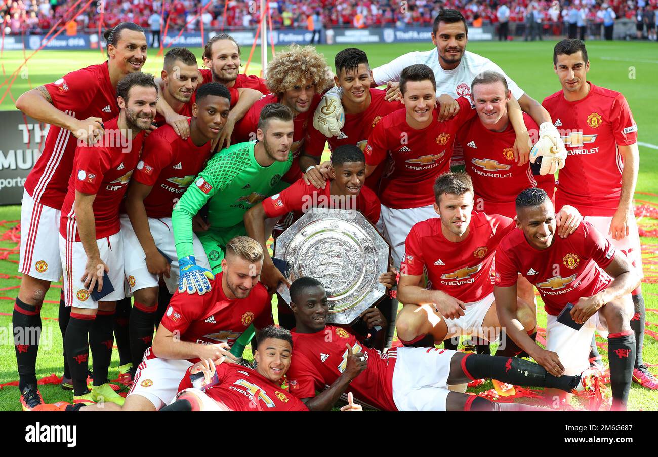 Manchester United players celebrate with the Community Shield ...