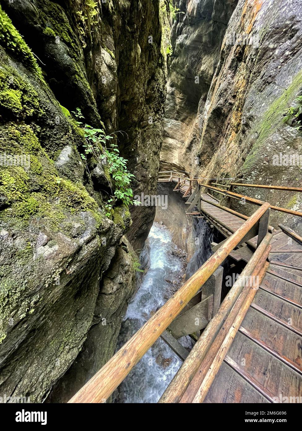 Steep stairs along waterfall and rocks in austria Stock Photo - Alamy