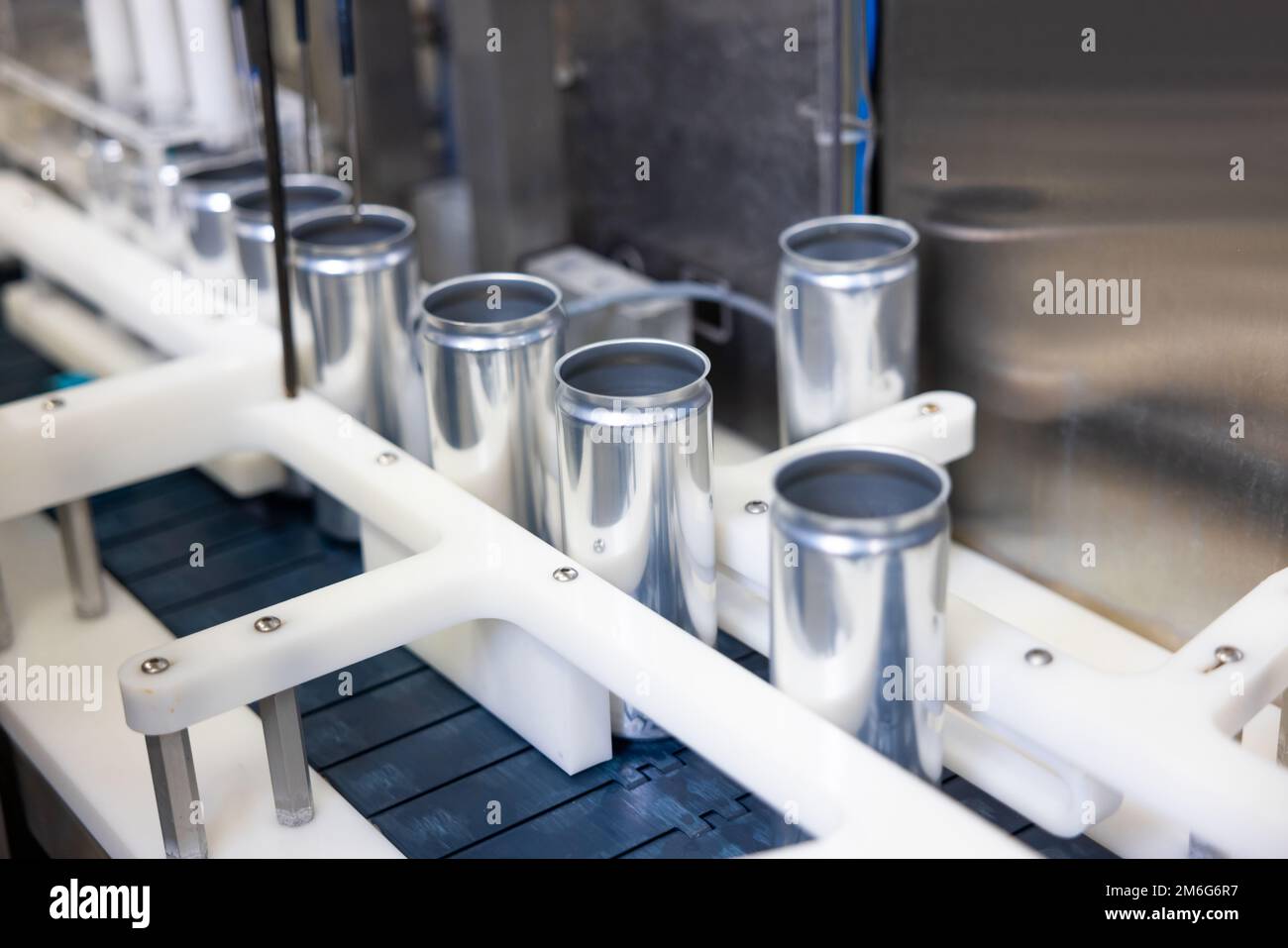 Modern drink canning equipment used in the factory Stock Photo - Alamy
