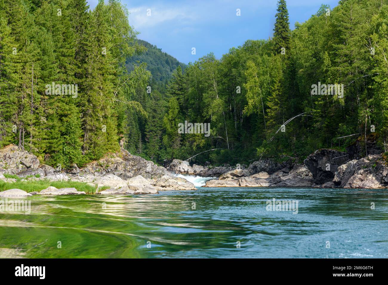 Rapid flow of mountain river water Stock Photo - Alamy